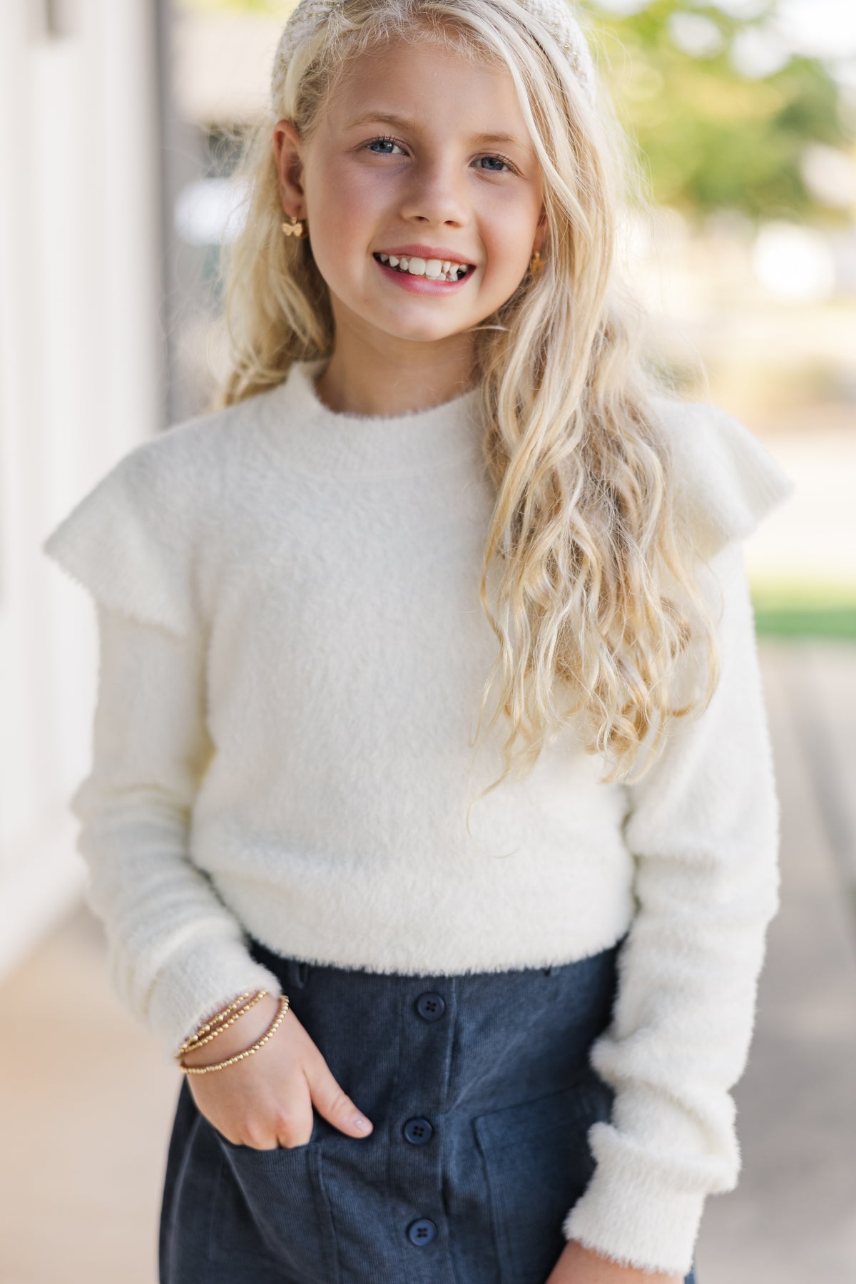 Girls: The Abby Ivory White Ruffled Sweater – Shop the Mint