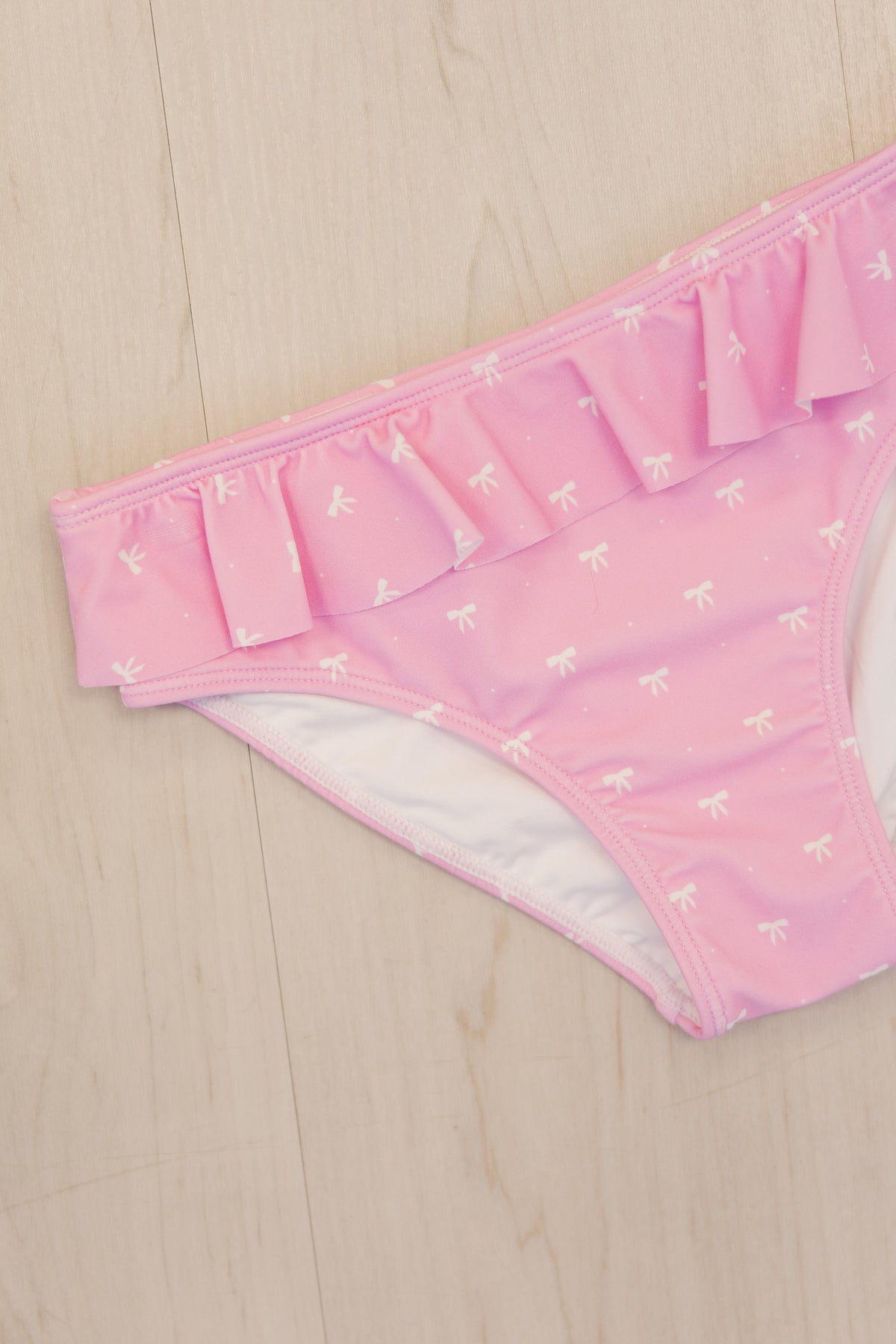 Girls: The Wendy Pink Bow Print Ruffled Two Piece Swimsuit – Shop the Mint