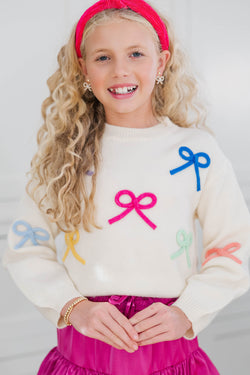 Girls: The Alyson Multicolored Bow Sweater – Shop the Mint
