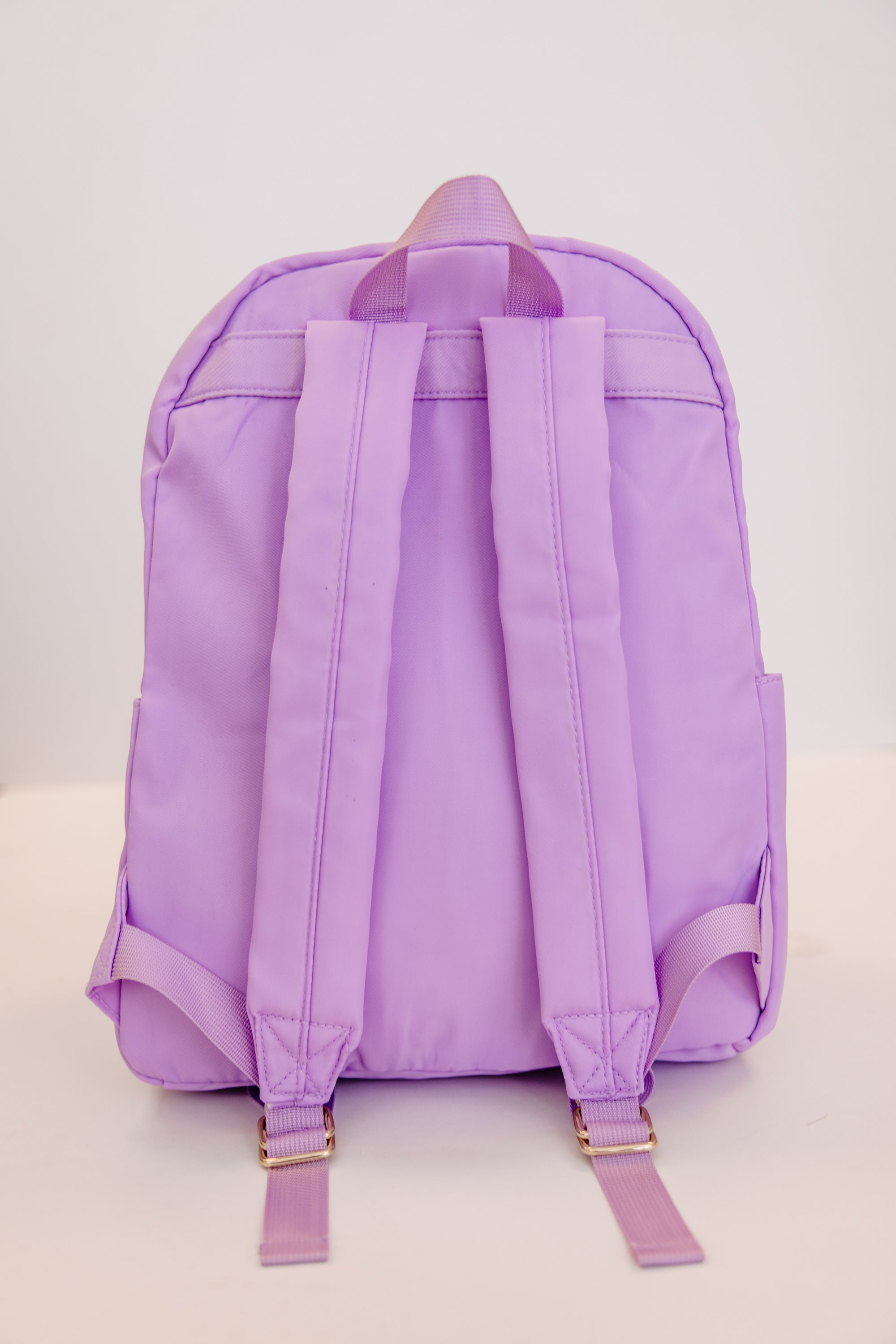 Easy Going Lilac Varsity Backpack#N# #N# #N# #N# –#N# Shop The Mint
